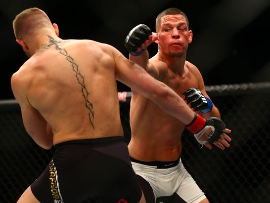 Nate Diaz stuns Conor McGregor with second-round submission at UFC 196 ...