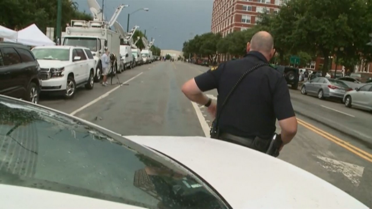Photos: SWAT responds to threat at DPD headquarters | wfaa.com