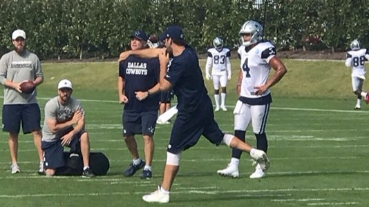 Romo throws during warmup portion of practice | wfaa.com